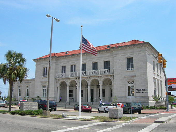 Gulfport's stately courthouse gleams white against blue skies &ndash; a coastal gem where beach living doesn't require a treasure chest.