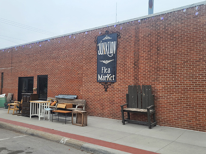 Junktion's brick facade promises vintage delights within. The sidewalk furniture display is just a teaser of what awaits inside.