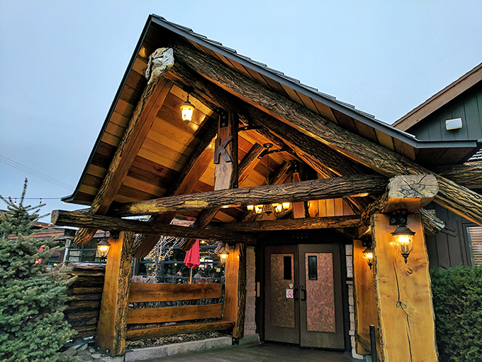 Krapil's entrance looks like Paul Bunyan's vacation cabin, if Paul had excellent taste in steak. Those timber beams tell stories!