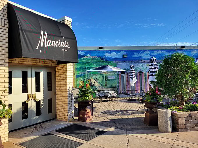 Mancini's elegant brick facade and classic black awning whisper of old-school charm. This St. Paul institution has been perfecting the art of char-grilled beef for generations.
