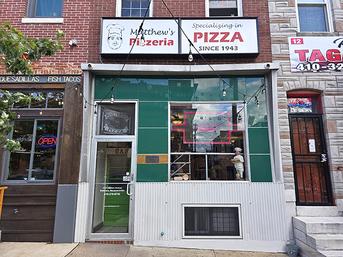 Matthew's green-tiled facade is like a portal to 1943 - when they started perfecting their legendary Baltimore pizza recipe.
