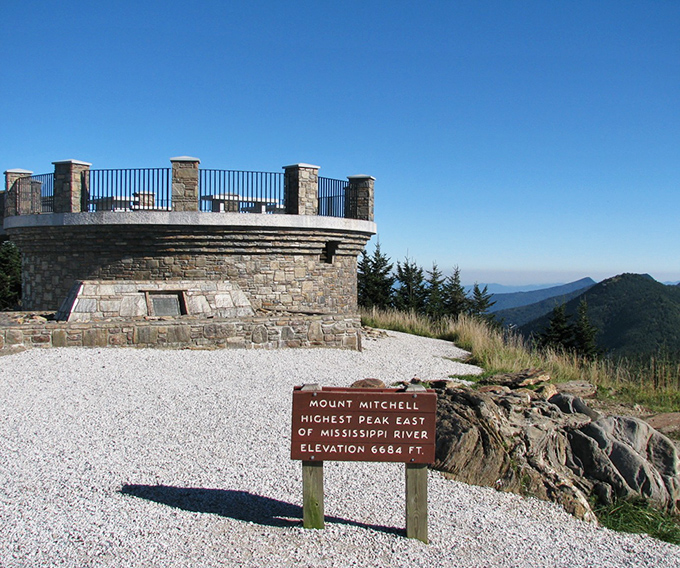 Mount Mitchell's observation deck: where clouds become your neighbors and the air feels champagne-crisp.