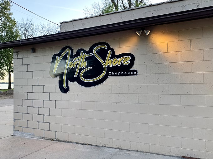 After dark, this unassuming building transforms into a beacon for those seeking seriously good meat.