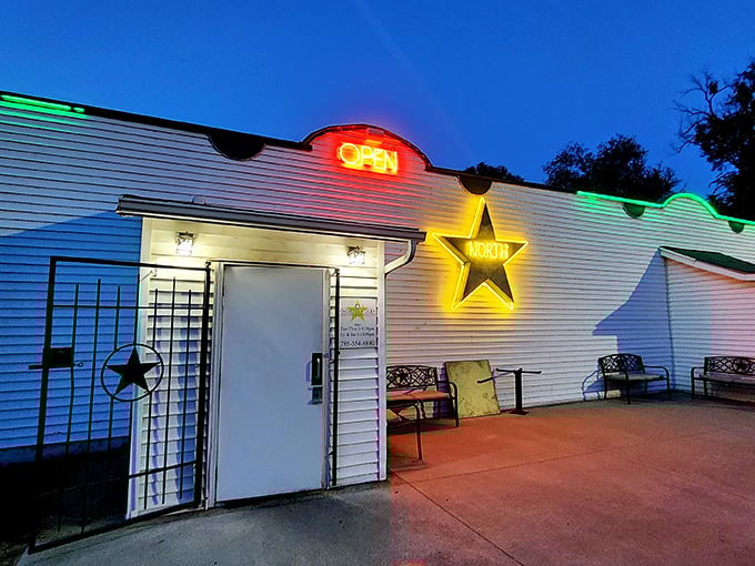 The North Star's white building transforms at dusk. When that neon star glows, it's like a bat signal for steak lovers!