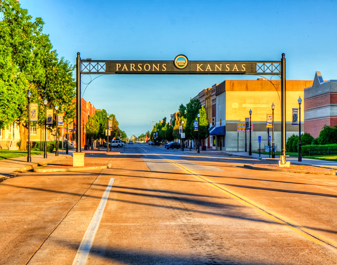 Parsons welcomes visitors with a statement arch that says, "Yes, we're small, but we're proud of who we are!"