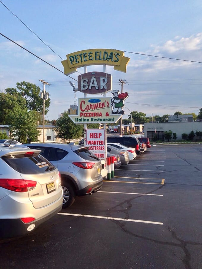 Pete & Elda's vintage sign stands tall in the parking lot &ndash; where thin-crust legends and free t-shirt challenges were born.