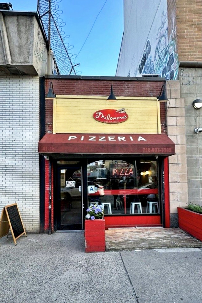 Philomena's cozy storefront sits between buildings like the middle child of pizza joints—quietly exceptional.