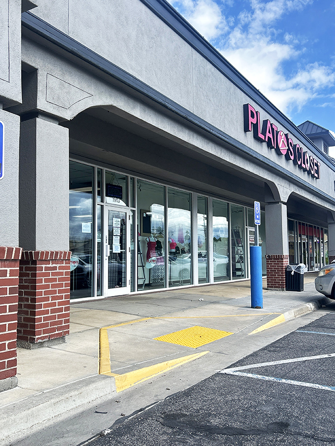 Plato's Closet: where teenage fashion dreams meet adult budget realities in a pink-signed paradise of possibilities.