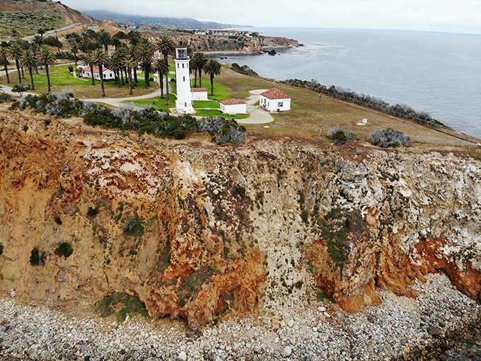 Sitting pretty on emerald cliffs, this lighthouse enjoys better real estate than most Hollywood stars. 