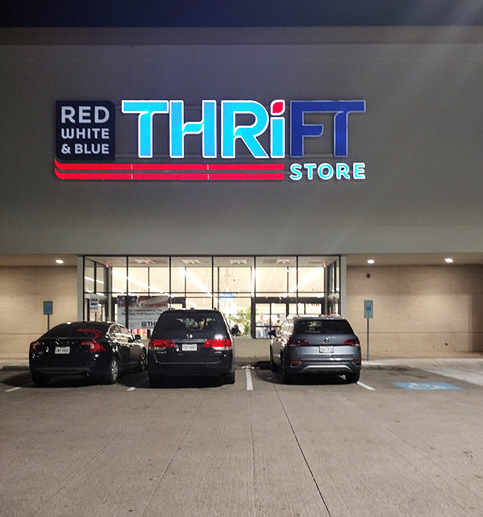 Red White & Blue's neon sign glows like a patriotic beacon in the night. A thrifting landmark that draws bargain hunters like moths!