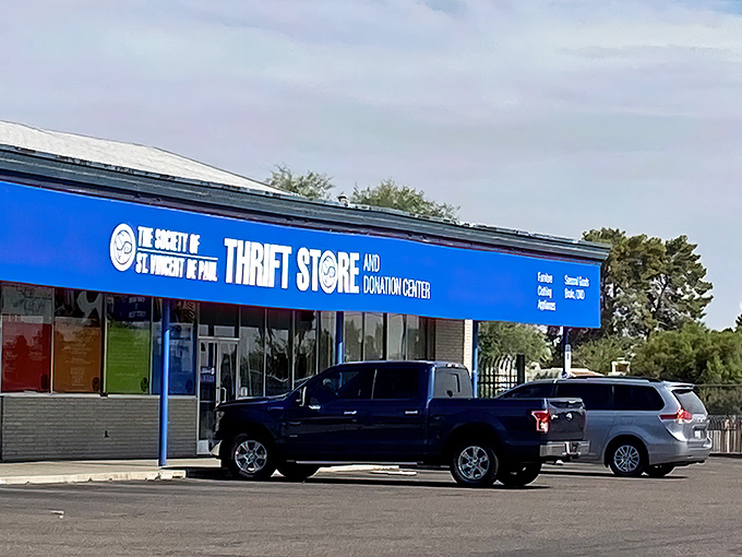 St. Vincent de Paul's bright blue awning serves as a beacon for bargain hunters in the Phoenix heat.