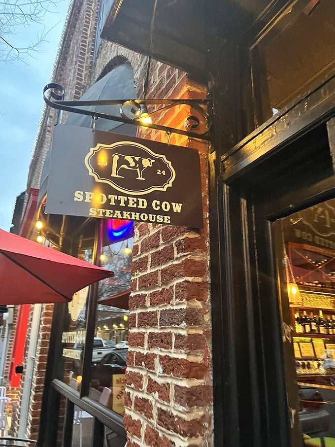 The Spotted Cow's vintage sign promises what lies within&mdash;a carnivore's playground in historic brick surroundings.