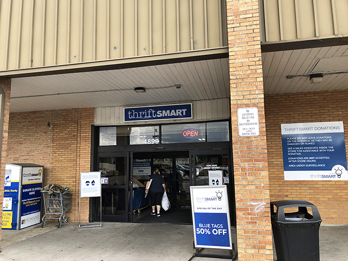 Blue skies and bigger bargains! ThriftSmart's cheerful sign with its lightbulb logo promises bright ideas for your budget and home.
