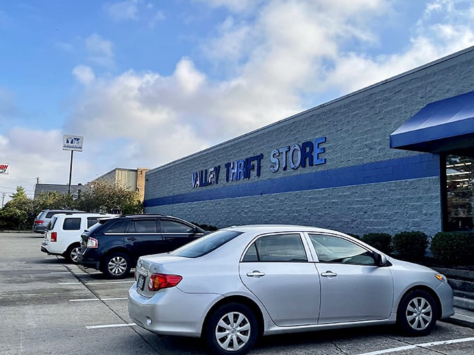 Thrift shopping with a landmark touch! That distinctive blue tower stands like a lighthouse guiding bargain seekers to shore.