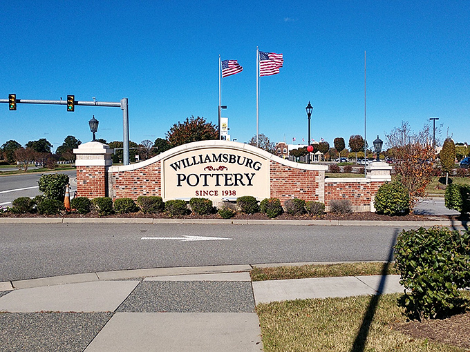Williamsburg Pottery's entrance sign stands as a landmark for generations of bargain hunters. Those American flags wave a patriotic welcome to shoppers.