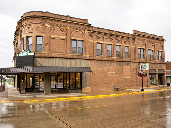 Rain-slicked streets reflect Austin's timeless architecture, where family businesses have served the community for decades.