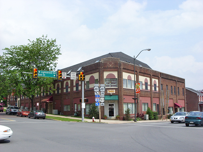 Bloomsburg's brick commercial district features practical architecture and affordable charm. The corner building houses businesses serving both college students and retirees on fixed incomes.