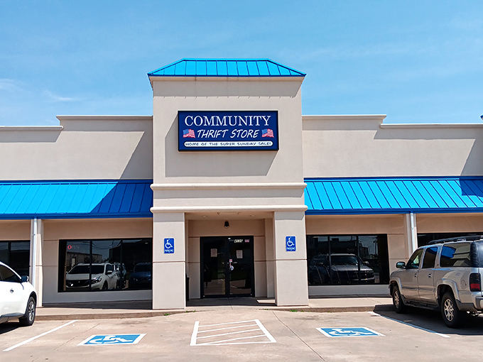 The bright blue trim frames Community Thrift Store like a picture. Inside that frame? A masterpiece of miscellany waiting to be discovered.
