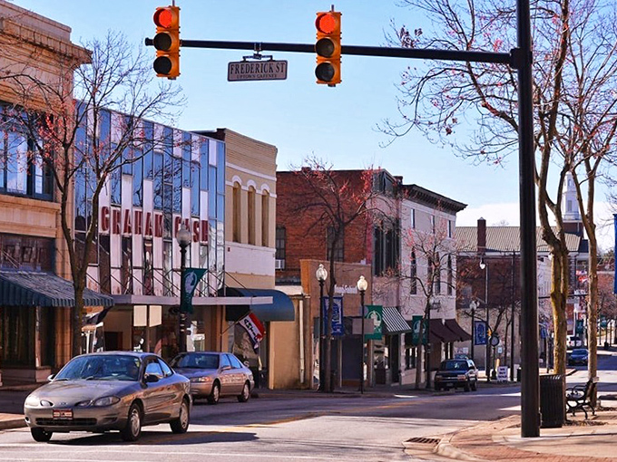 The tree-lined parking area in Gaffney's town center offers shade for shoppers exploring local businesses on sunny South Carolina days.