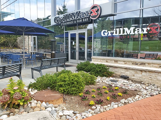 Outdoor dining with style at GrillMarX. Those blue umbrellas have sheltered many moments of "this is the best steak I've ever had."