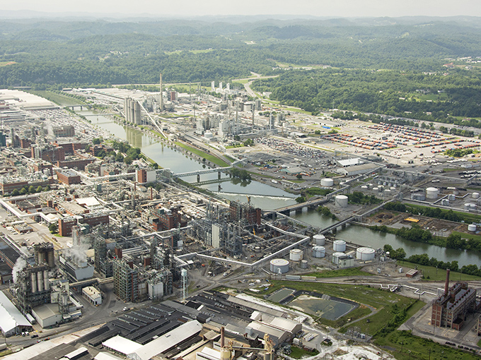 The sun setting over Kingsport's storefronts creates that golden hour glow that makes even everyday errands feel like a Norman Rockwell painting.