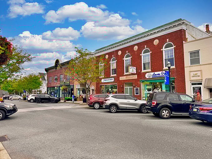 Sunlight dapples through mature trees along Lewes' historic streets, where centuries-old homes tell stories without saying a word.