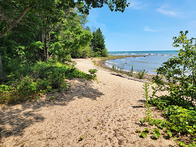 A hidden path leads to Negwegon's secluded beach&mdash;nature's version of the VIP entrance to Lake Huron's finest waterfront real estate.