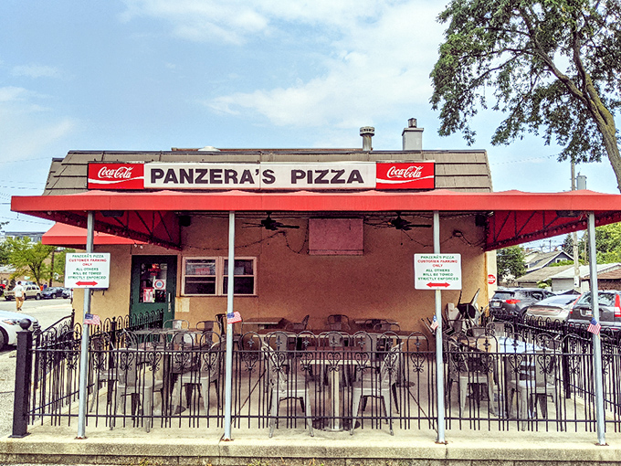 The outdoor seating at Panzera's &ndash; where summer nights, cold drinks, and perfect pizza create memories warmer than their ovens.