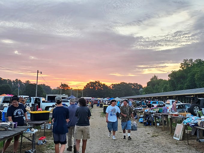 Dawn of the deal hunters! Early birds catch the best bargains at Pickens County Flea Market as the sun rises over tables of potential treasures.