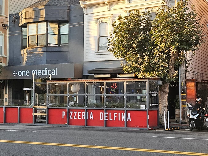 That sidewalk seating area isn't just for show &ndash; it's prime real estate for people-watching while your pizza cools just enough to eat.
