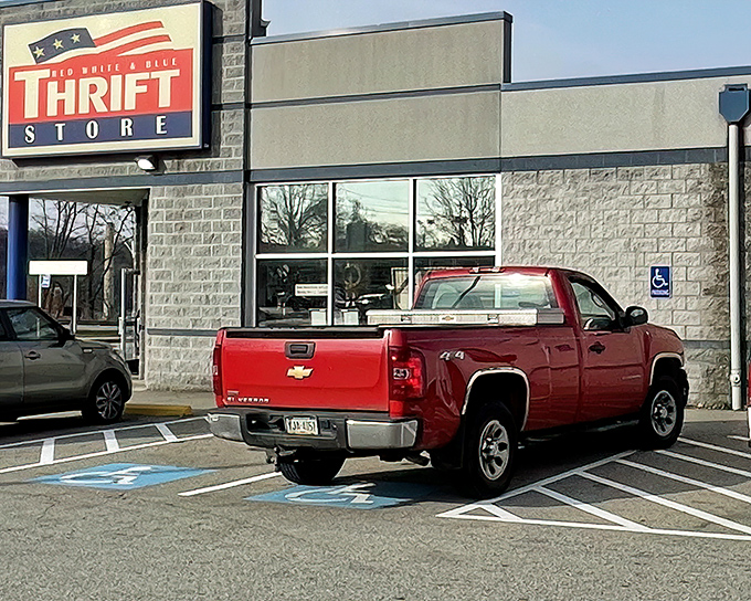 That red pickup seems to know something we all should: this thrift store holds treasures worth hauling home.