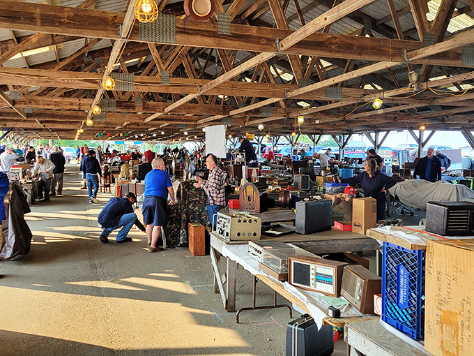 Sunlight streams through Renninger's open-air structure, illuminating shoppers on their quest for that perfect vintage find.