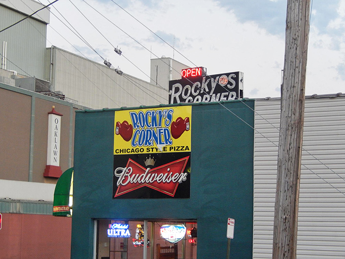 The warm lights and welcoming storefront suggest this is where pizza dreams come true, one slice at a time. 