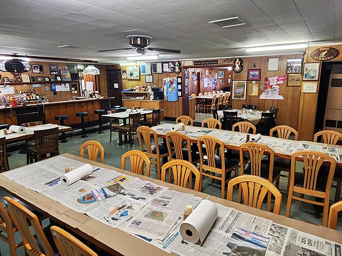 Inside Sambo's, newspaper-covered tables aren't about saving on cleaning costs &ndash; they're your invitation to gloriously messy crab feasting!