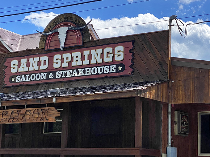 That rustic wooden exterior and classic saloon signage promises a steak experience with authentic frontier attitude.