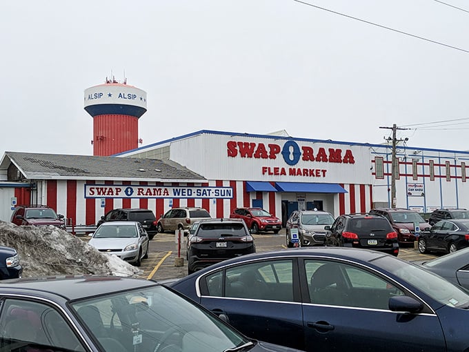 The Alsip water tower watches over Swap-O-Rama like a sentinel guarding a kingdom of secondhand treasures.