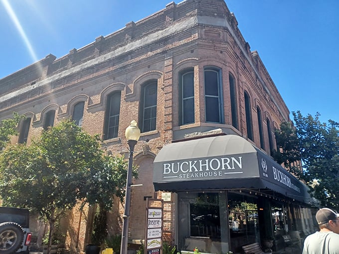 Sunlight bathes this corner steakhouse in golden light. A century-old building serving cuts that make time stand still.