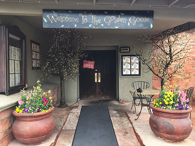 Welcome signs don't lie - especially when they're guarding gates to grilled meat paradise within. 