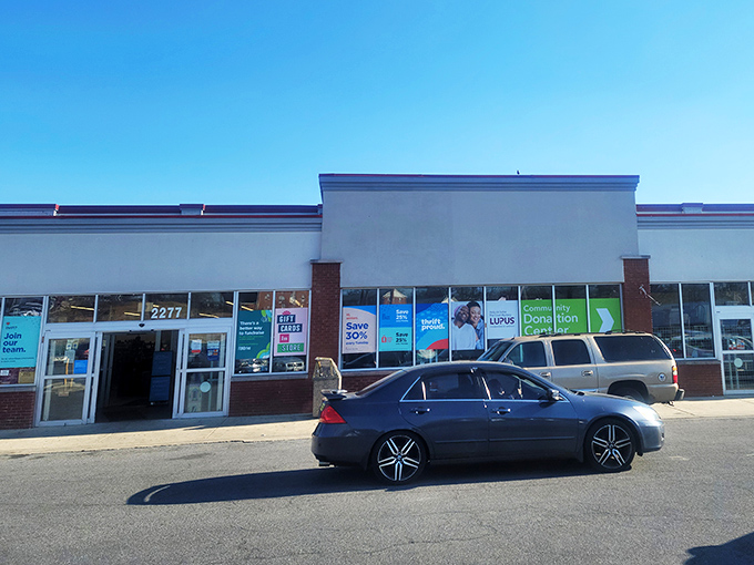 Behind these brick walls and simple windows lies a universe of possibilities. Value Village's storefront promises adventure for the patient hunter.