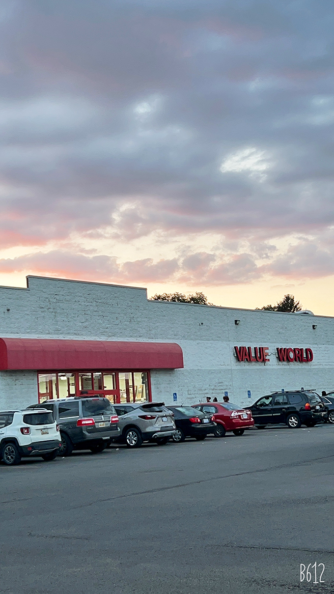 The white brick facade with that pop of red awning&mdash;like a present waiting to be unwrapped by eager bargain hunters.