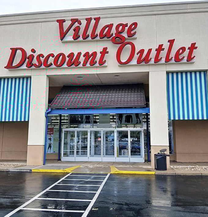 A closer view of the Village Discount sign&mdash;the North Star for thrifters navigating the seas of secondhand shopping.