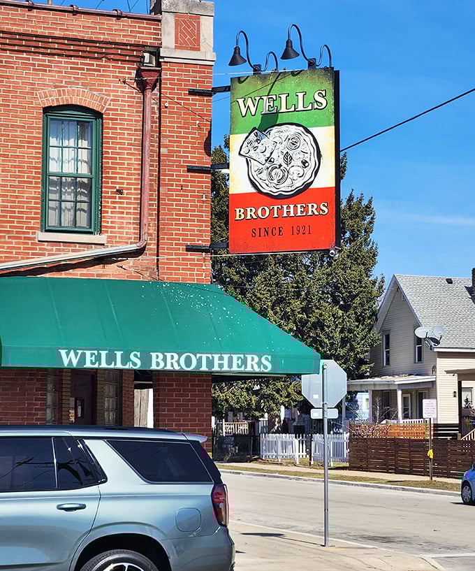 That Italian flag-colored sign is like a beacon for pizza lovers. Wells Brothers: where Wisconsin meets Naples in the best possible way.