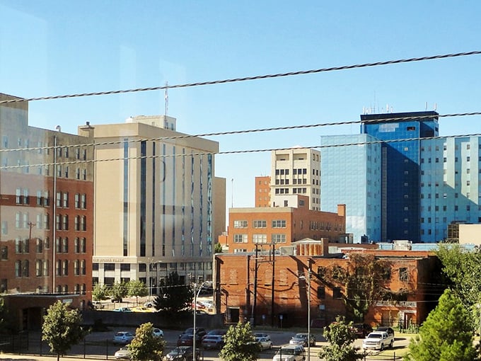 Cars cruise through Wichita Falls' business district, where brick buildings have witnessed decades of Texas life unfolding at its own unhurried pace.