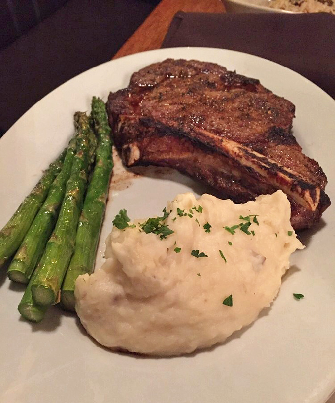 The ribeye arrives like a rustic work of art &ndash; perfectly charred exterior, tender pink center, and sides that know their supporting role.