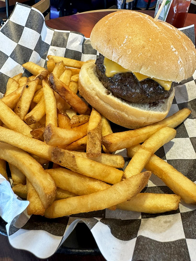 This isn't just a cheeseburger&mdash;it's a monument to beef perfection. That melty American cheese blanket is tucking in a patty ready for its close-up.