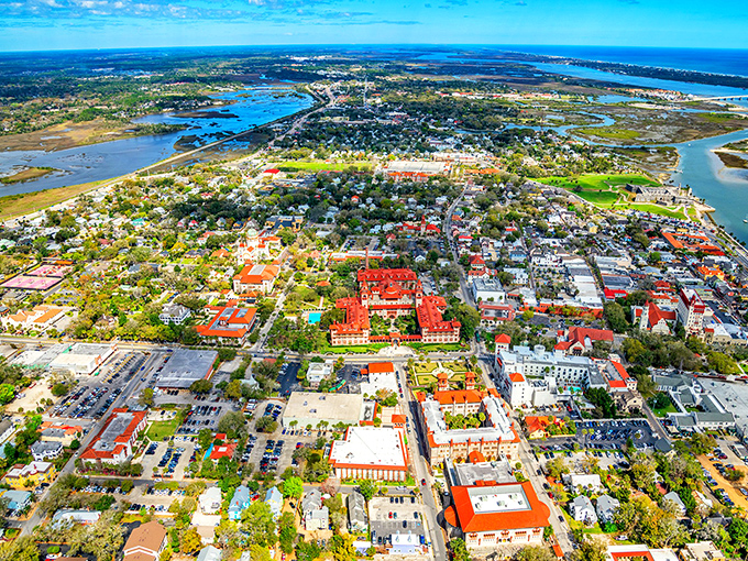 From above, St. Augustine reveals its perfect marriage of nature and architecture—terra cotta rooftops nestled between blue waterways like a Renaissance painting.