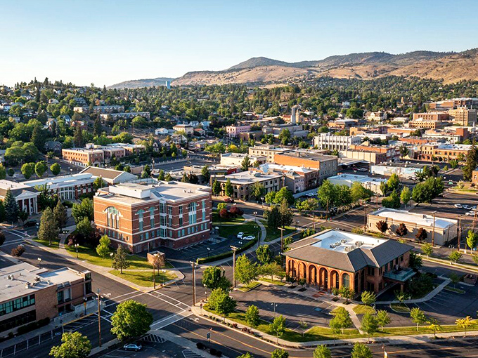 From above, Klamath Falls reveals itself as a perfect patchwork of historic buildings, tree-lined streets, and modern amenities nestled against golden hillsides.