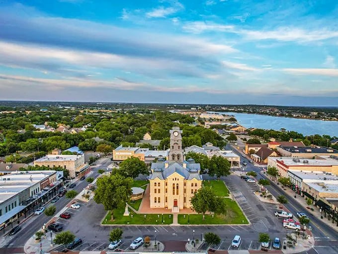 This aerial view isn't actually Winthrop (appears to be a different town), but Winthrop's layout similarly embraces its natural surroundings rather than fighting against them.