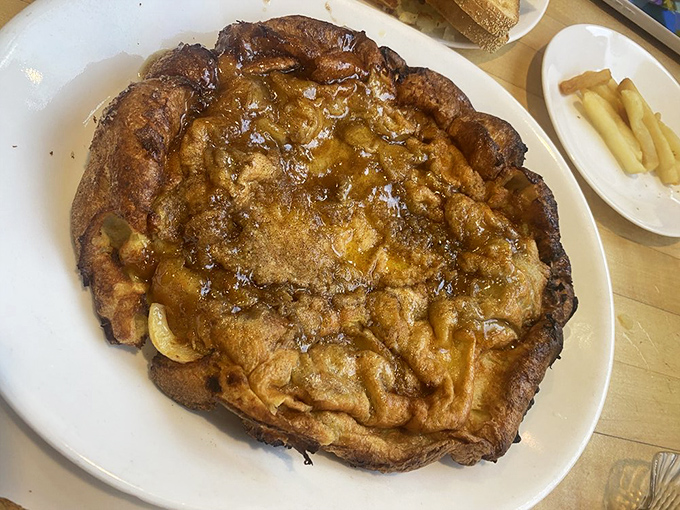 Not just an apple pancake &ndash; it's an architectural marvel of caramelized fruit and puffy batter that makes ordinary breakfast seem like a missed opportunity.