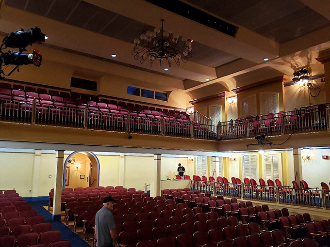 Inside the Opera House, red velvet seats await patrons like old friends, ready to cradle you through performances that rival those in cities ten times Newberry's size.